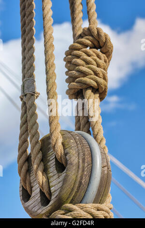 wooden block and tackle pulley on a sailing ship Stock Photo - Alamy