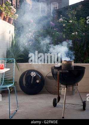 smoking barbecue in porch Stock Photo - Alamy