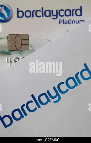 Barclaycard Visa bank card on a computer keyboard with a white ...