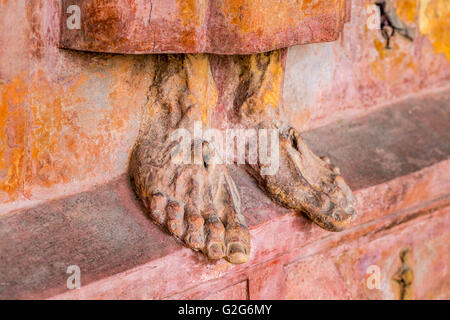 Feet of an ancient statue Stock Photo - Alamy