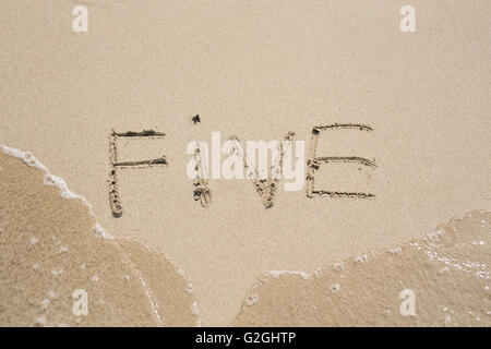Number five. Sand Alphabet: digits. Concept holiday background Stock ...