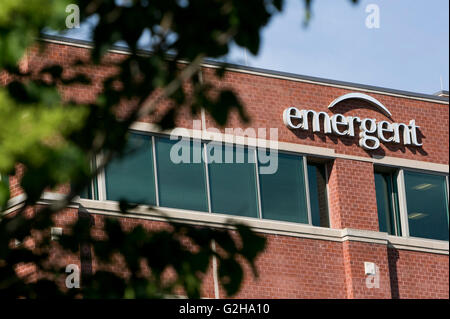 A logo sign outside of the headquarters of Emergent BioSolutions in ...