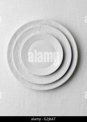 stack of fancy plates Stock Photo - Alamy