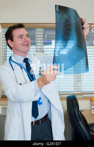 portrait of doctor examining x-ray Stock Photo - Alamy