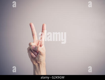 two fingers salute - hand gesture isolated on white background Stock ...