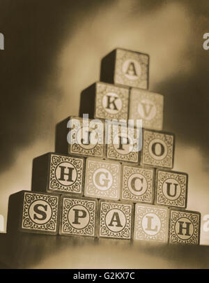 Alphabet toys. Pyramid of building blocks with letters of the alphabet ...