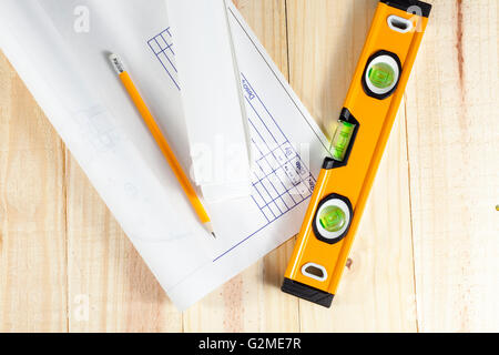 Technical plan drawing with spirit level construction hat Stock Photo ...