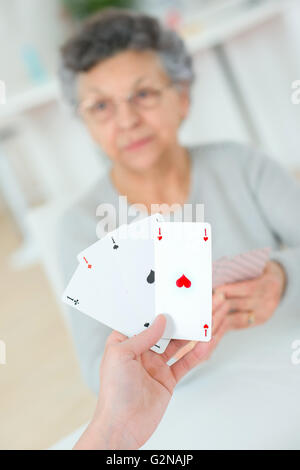 playing cards with granny Stock Photo - Alamy
