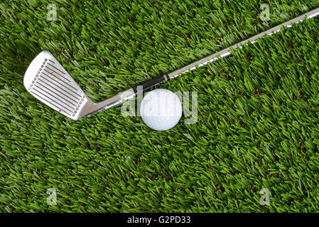 top view of golf club and ball in grass Stock Photo - Alamy