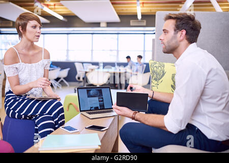 Business meeting between two professionals at conference table Stock ...