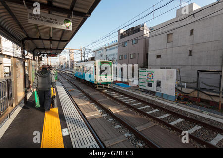A Toden Arakawa Line tram (known as Tokyo Sakura Tram) at Oji Station ...
