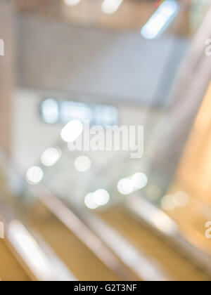 abstract escalator in shopping mall, Moving up staircase, yellow bands ...