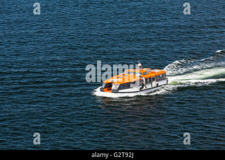 Cruise ship Zaandam tender boat transporting passengers to Port Stanley ...