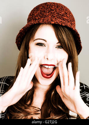 Young happy caucasian woman is calling with a mobile phone Stock Photo ...