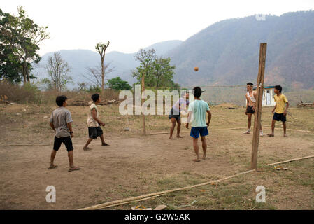 Sepak Takraw (kick volleyball) ball on plain background with soccer ...