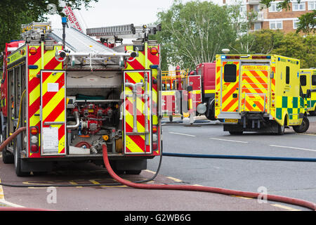 Firemen checking the fire engine inside the fire department from a bird ...