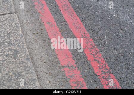 Red Route double red lines on road, UK Stock Photo - Alamy