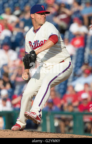 Philadelphia Phillies pitcher Andrew Bailey smiles and points at a ...