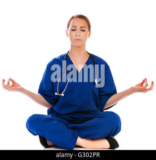 two pretty nurses doing meditation during break in hospital Stock Photo ...