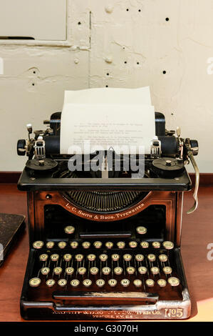 Old-fashioned typewriter with instructions for Cypher messages on board ...