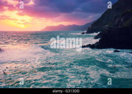 Sunset over rocky coast. Cinque Terre Stock Photo - Alamy