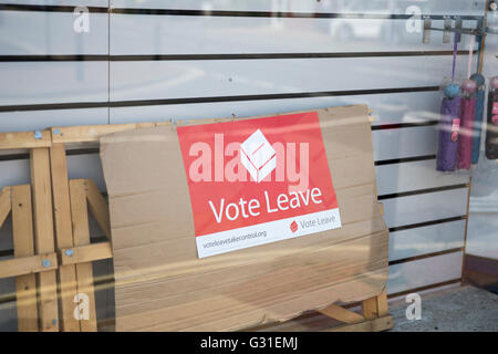 A Vote Leave campaign poster situated inside a shop window in ...