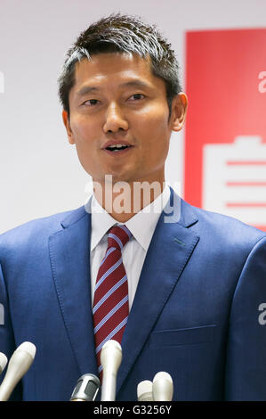 Former volleyball player Kentaro Asahi poses for the cameras on the red ...