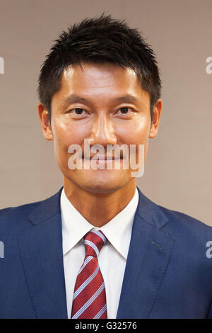 Former volleyball player Kentaro Asahi poses for the cameras on the red ...