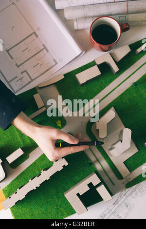 Top view of architect drawing on architectural project Stock Photo - Alamy