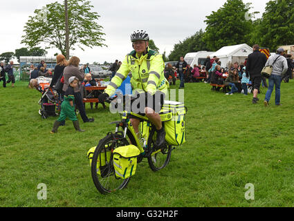 A St. John Ambulance cycle first responder on a bike Stock Photo - Alamy