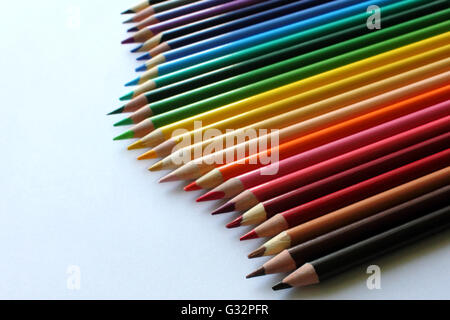 Sharpened coloured pencil crayons in their box Stock Photo - Alamy