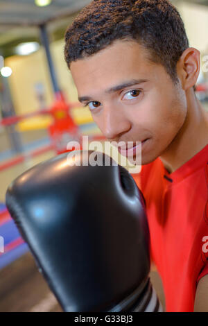 Portrait of a male boxer with his fists raised ready to fight Stock ...