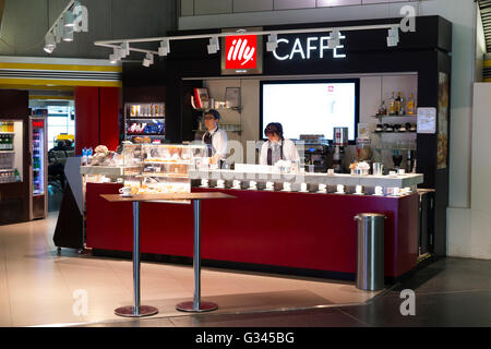 Illy brand Caffe / cafe coffee shop which serves / is serving drinks ...