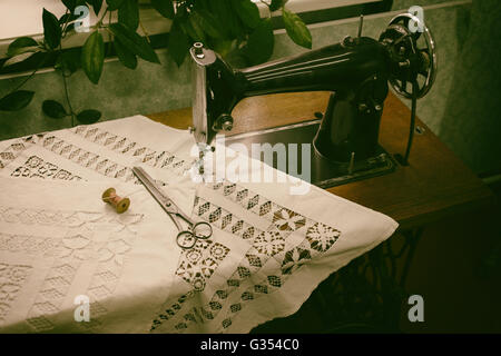 Retro sewing accessories on black wooden background Stock Photo - Alamy