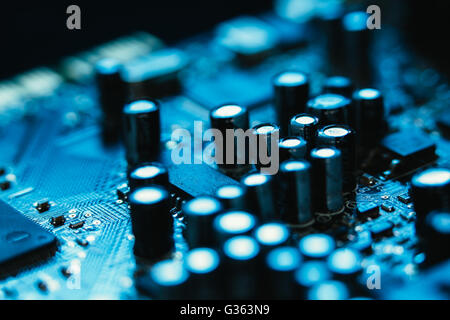 Computer motherboard closeup blue color on dark background Stock Photo ...