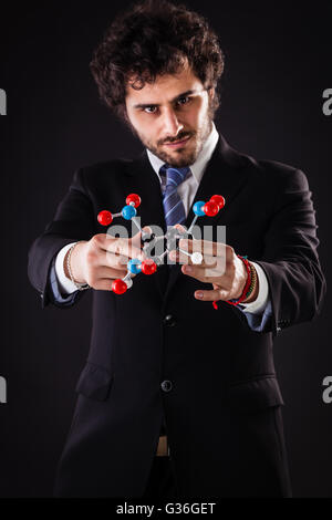 TNT molecule. Molecular model of trinitrotoluene (TNT, formula C7H5N3O6 ...