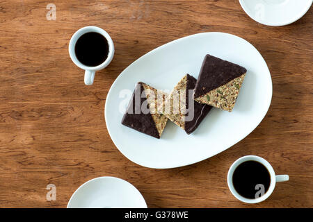 Coffee break with snack Stock Photo - Alamy