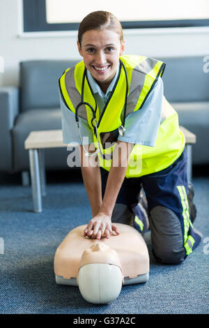 Smiling Female Paramedic Looking at Camera and Posing with Crossed ...