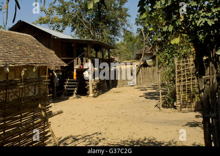 Houses in a typical AKHA village near KENGTUNG also known as KYAINGTONG ...