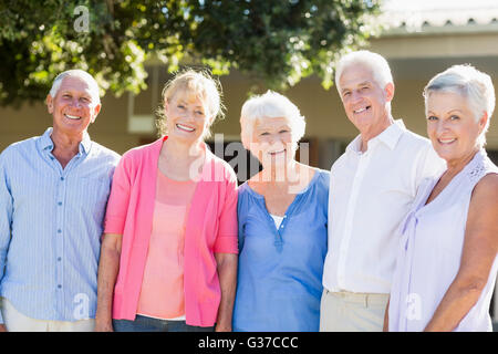 Seniors standing together Stock Photo - Alamy