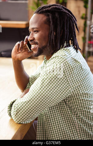 Happy business man making a call Stock Photo - Alamy