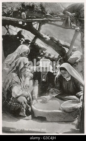 ROTARY QUERN MILLING Stock Photo - Alamy