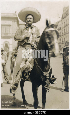Mexican charro or cowboy on horseback in a lienzo charro (aka arena ...