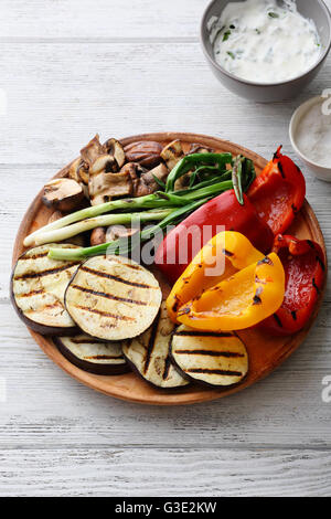 Grilled vegetables with mushroom sauce Stock Photo - Alamy