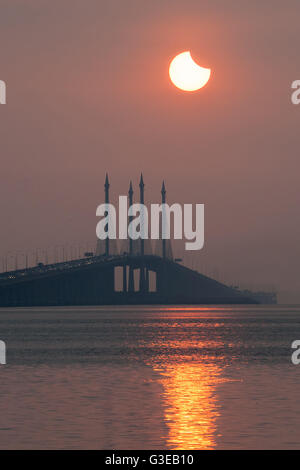 Solar Eclipse in Penang Bridge, Malaysia Stock Photo - Alamy