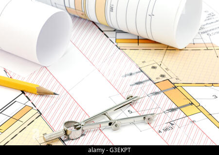 Engineering and architecture drawings with yellow pencil Stock Photo ...
