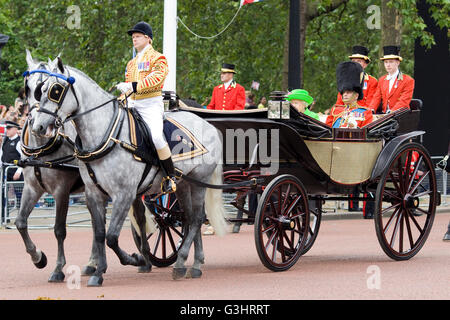The Royal coach with Queen Elizabeth 11 and Prince Phillip on the way ...