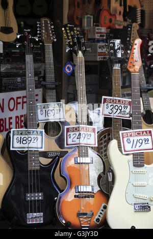 guitars displaying in the window of a musical instrument store in Old ...