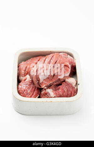 Pork hind leg on white background Stock Photo - Alamy