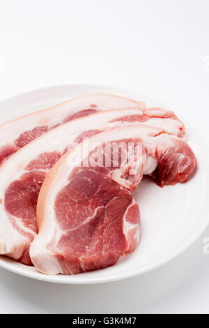 Pork hind leg on white background Stock Photo - Alamy
